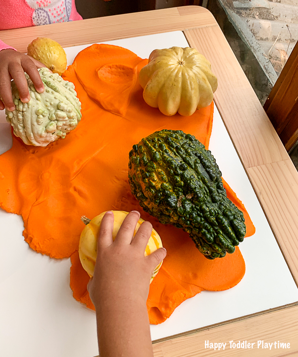 Pumpkins & Play Dough Invitation to Play - Happy Toddler Playtime