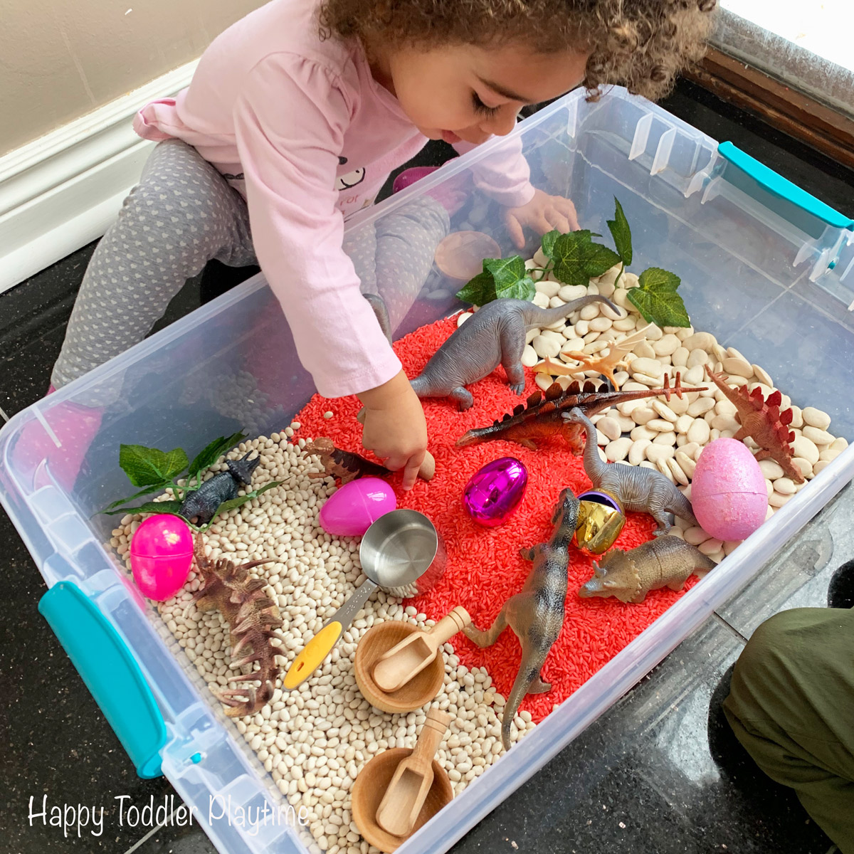 Valentine's Day Dinosaur Sensory Bin - Happy Toddler Playtime
