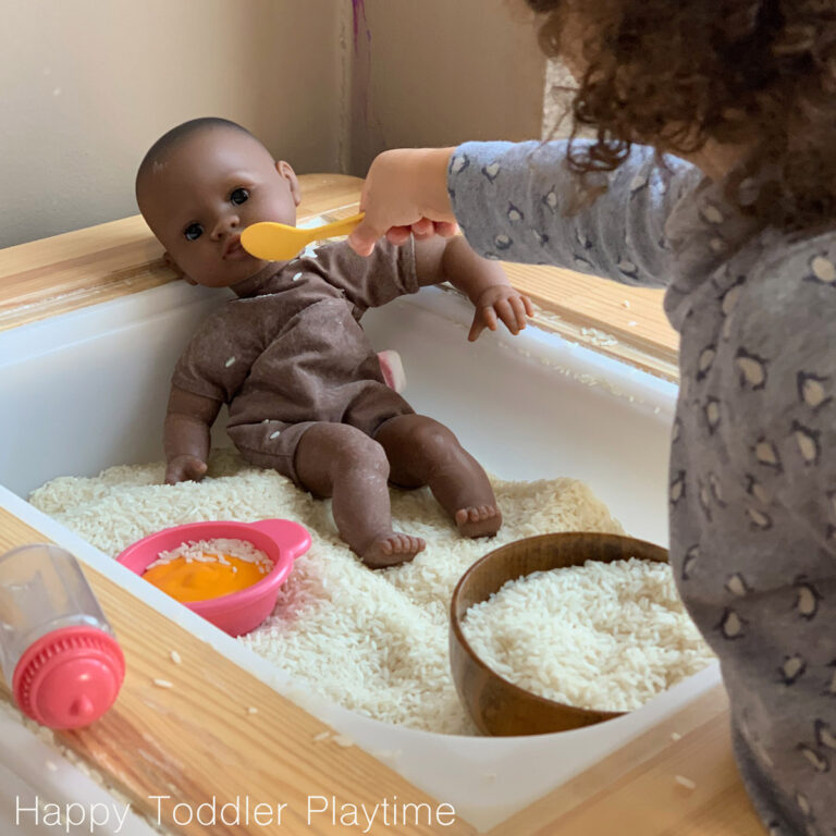 Feed the Baby Sensory Bin - Happy Toddler Playtime