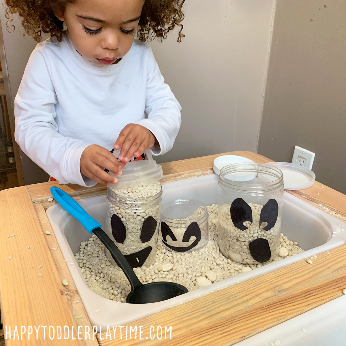 Ghost Sensory Bin: Scoop & Pour Activity - Happy Toddler Playtime