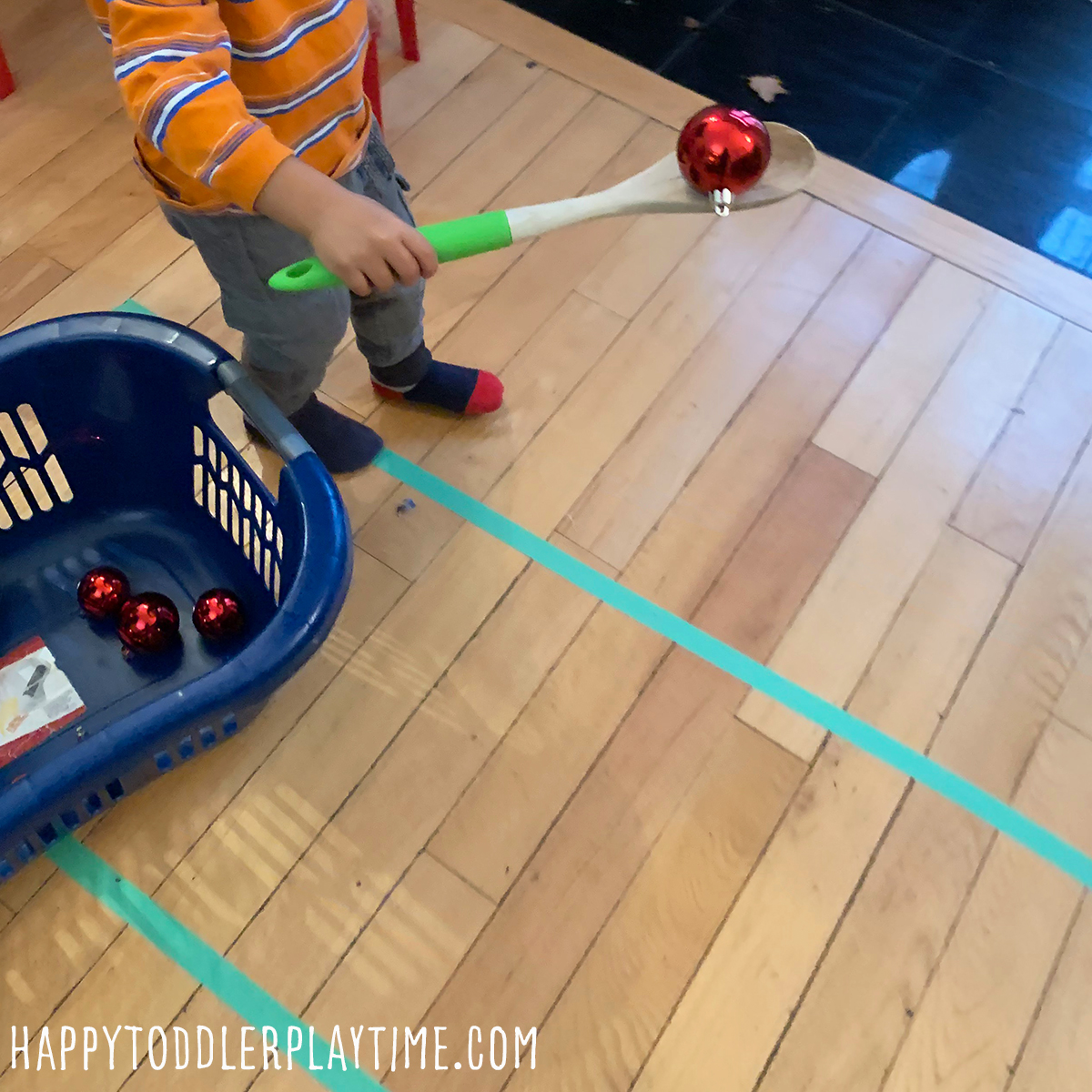 Christmas Ornament Balance Race - Happy Toddler Playtime