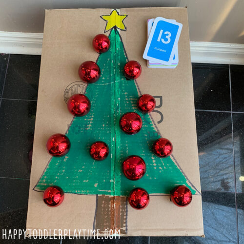 Christmas Ornament Balance Race - Happy Toddler Playtime