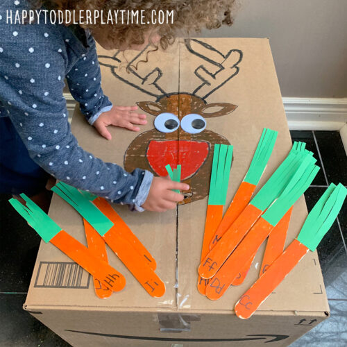 Feed the Reindeer Literacy Game - Happy Toddler Playtime