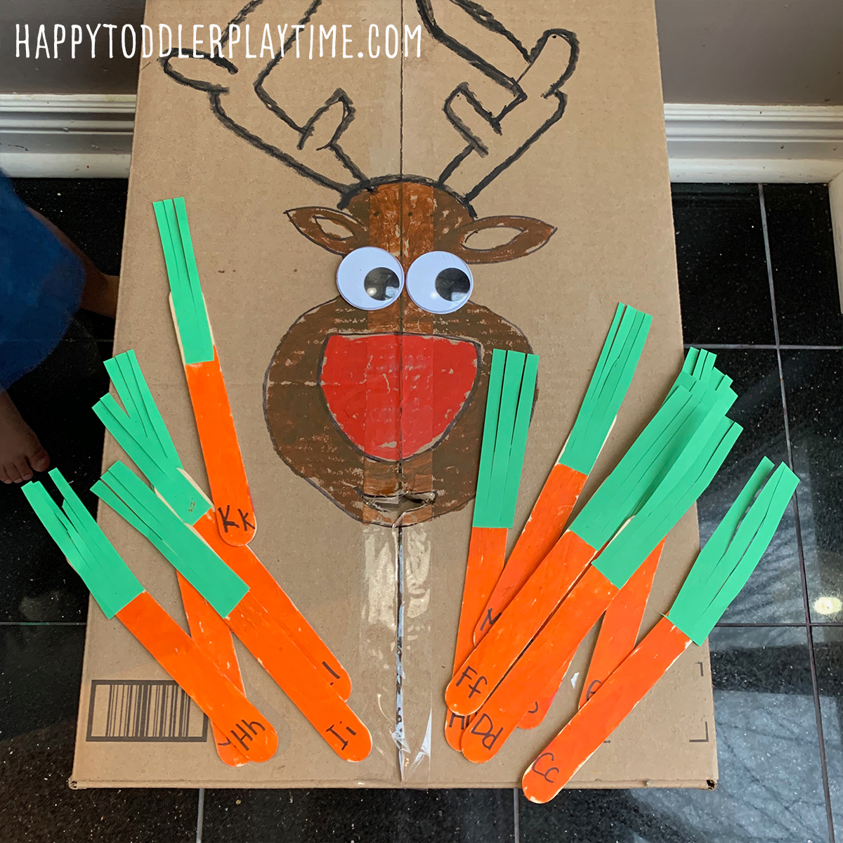 Feed the Reindeer Literacy Game - Happy Toddler Playtime