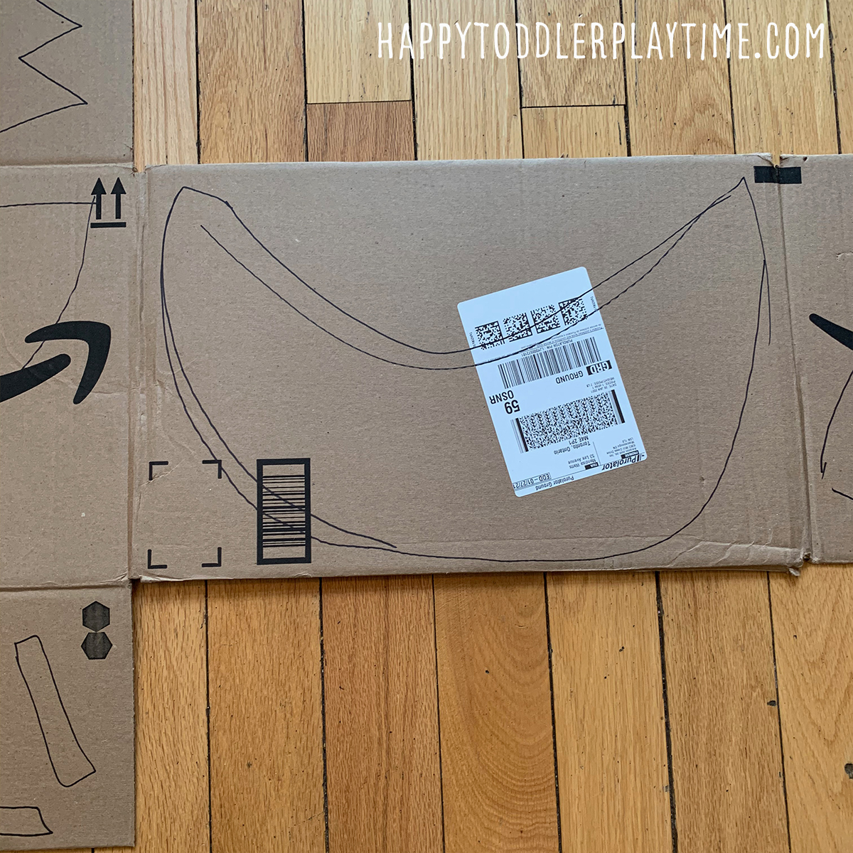 Easy Giant Cardboard Bird Craft - Happy Toddler Playtime