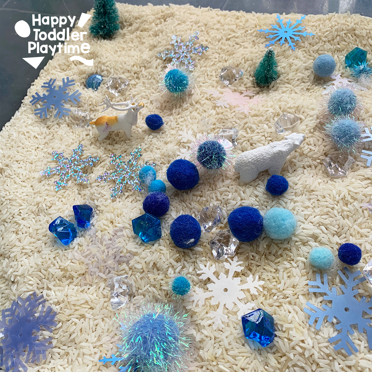 Super Easy Winter Rice Sensory Bin - Happy Toddler Playtime