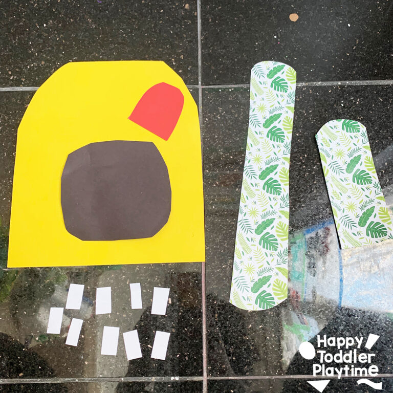 Catching Snowflakes Sticky Wall Craft - Happy Toddler Playtime