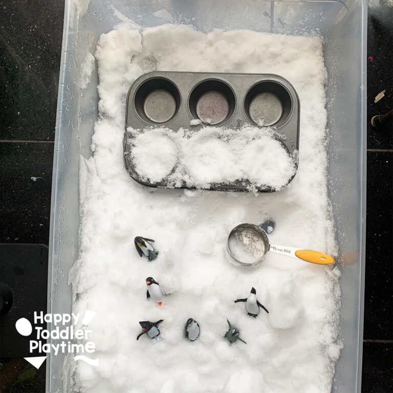 Hide the Penguins Sensory Bin - Happy Toddler Playtime