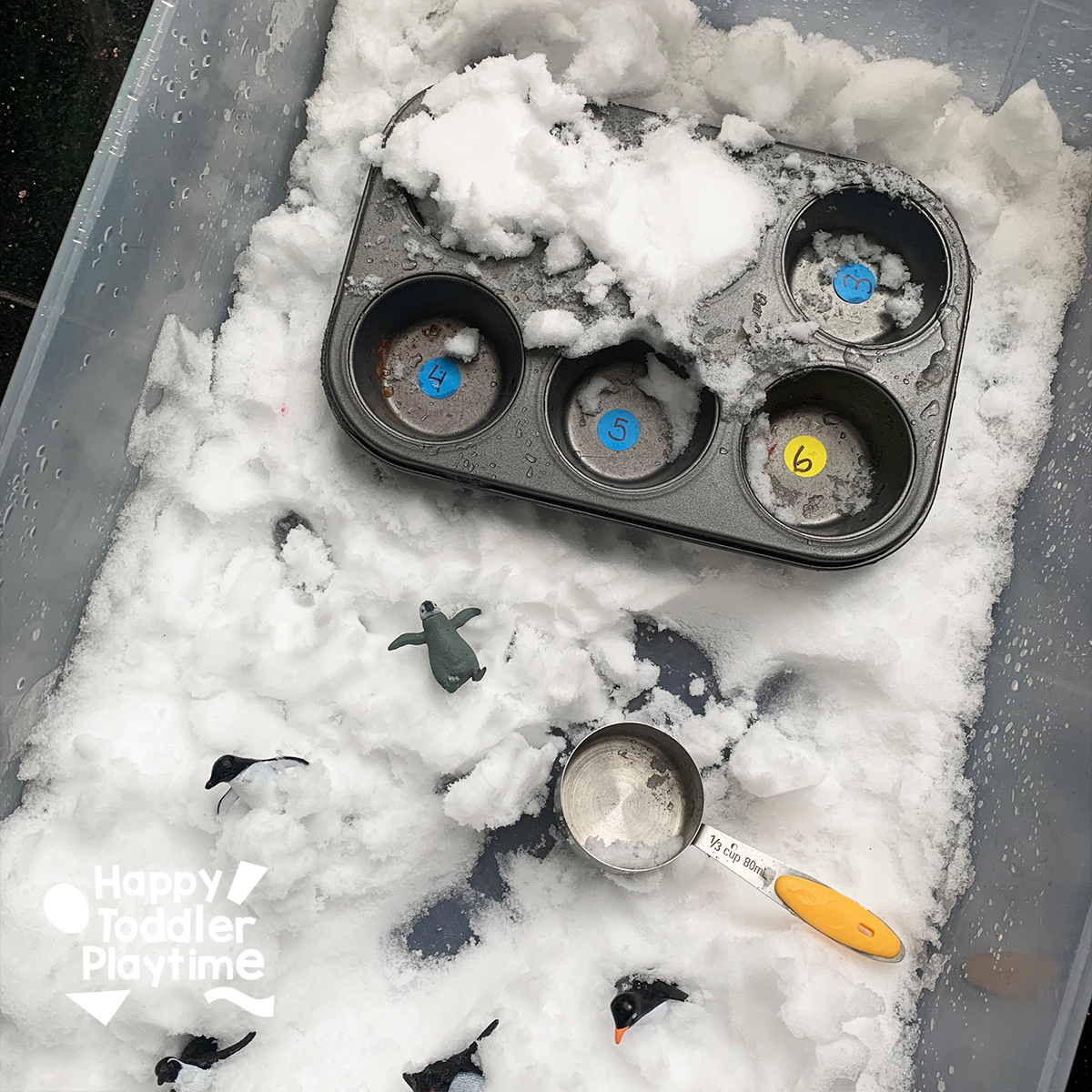 Hide the Penguins Sensory Bin - Happy Toddler Playtime