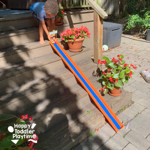 How to Make a Pool Noodle Racetrack this Summer - Happy Toddler Playtime