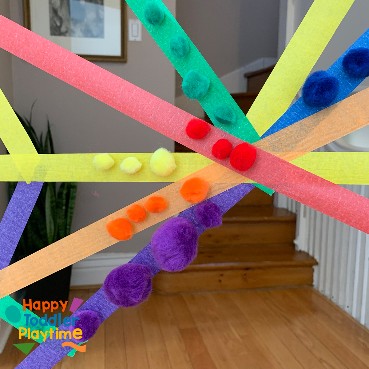 Pom Pom Tape Spider Web: Gross Motor Activity - Happy Toddler Playtime