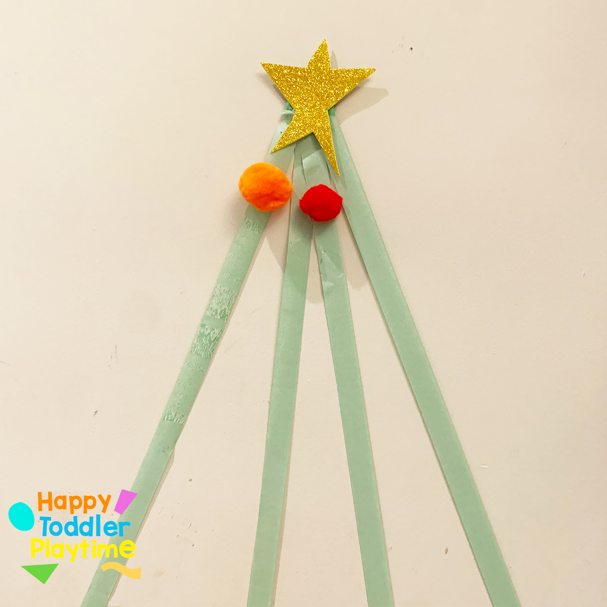Tape Christmas Tree Activity for Toddlers - Happy Toddler Playtime