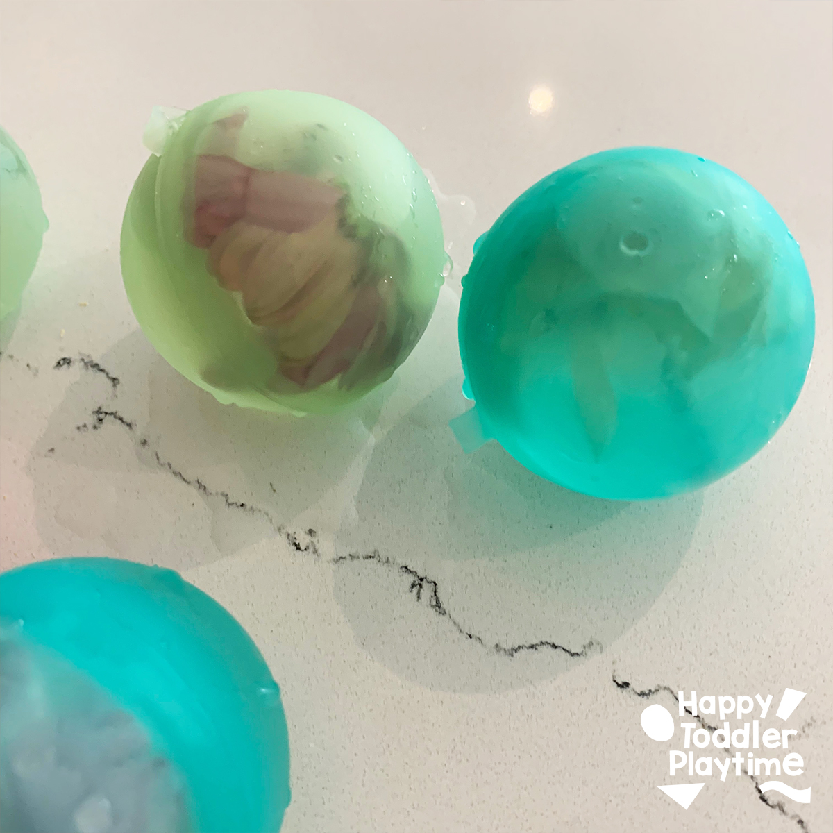 Frozen Flower Bombs: Easy STEM Activity - Happy Toddler Playtime