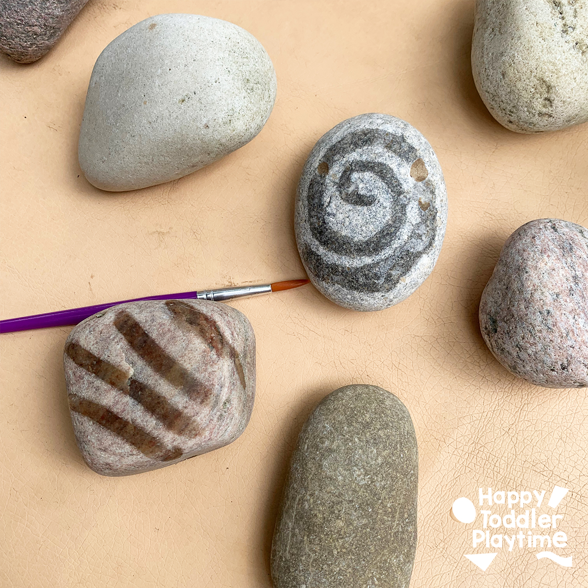 Mess Free Rock Painting with Water Toddler Activity - Happy Toddler ...