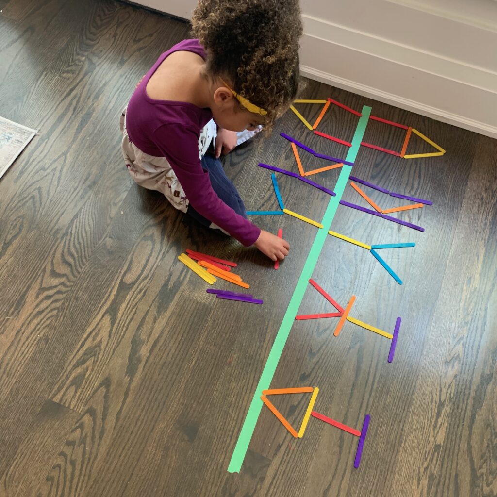 Easy Reflection Symmetry Activity with Popsicle Sticks - Happy Toddler ...