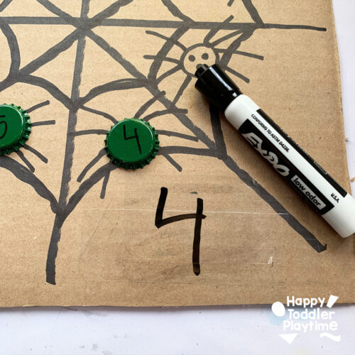 Spider Bottle Cap Counting Board - Happy Toddler Playtime