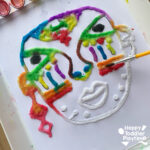 Salt Painted African Masks Craft - Happy Toddler Playtime