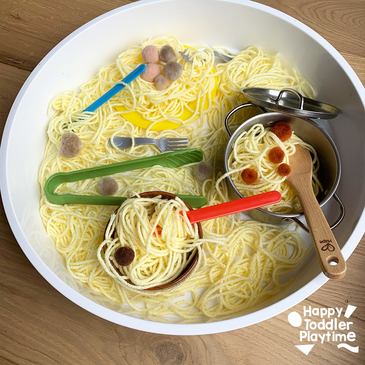 Spaghetti Sensory Bin - Happy Toddler Playtime