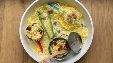 Spaghetti Sensory Bin - Happy Toddler Playtime