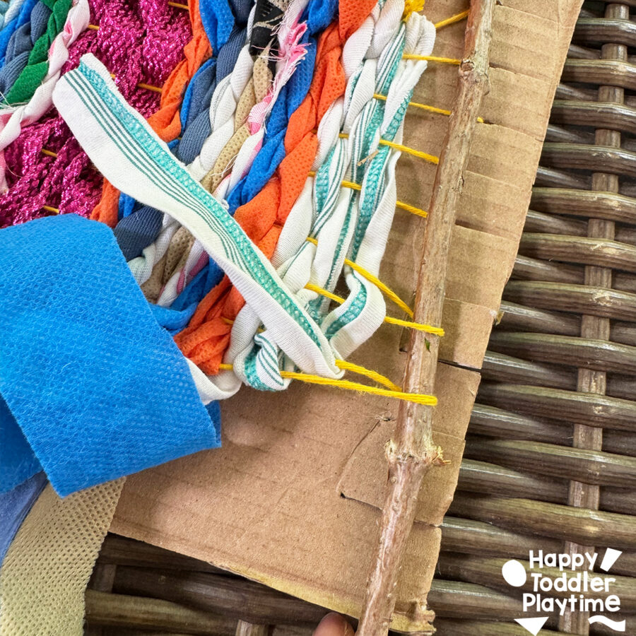 How to Make a DIY Cardboard Weaving Loom - Happy Toddler Playtime