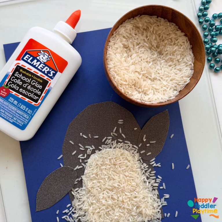 Sensory Rice Penguin Craft - Happy Toddler Playtime
