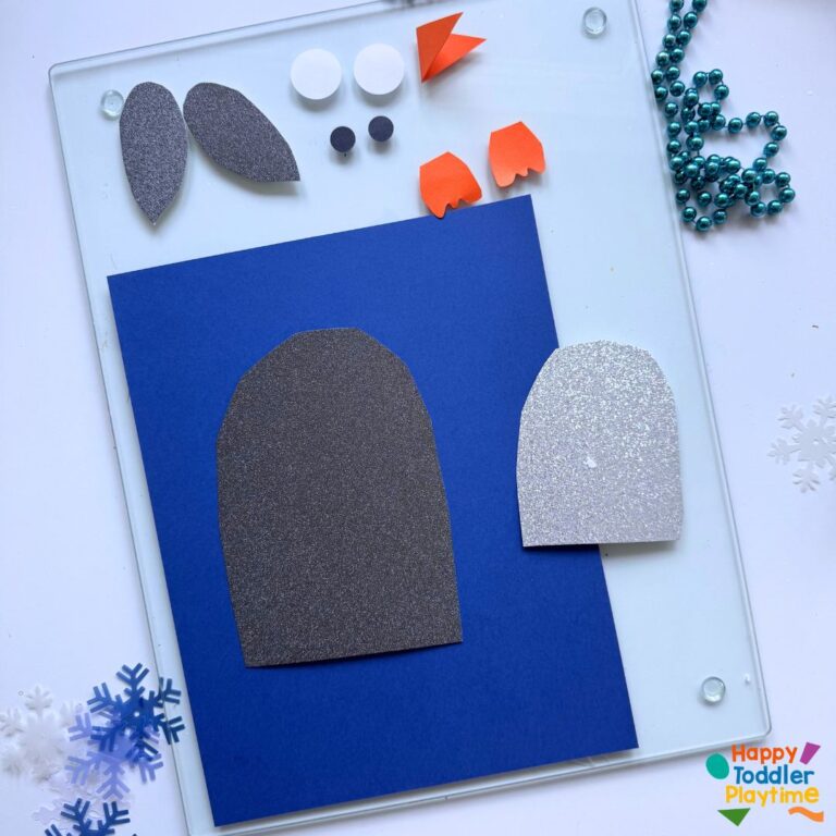Sensory Rice Penguin Craft - Happy Toddler Playtime