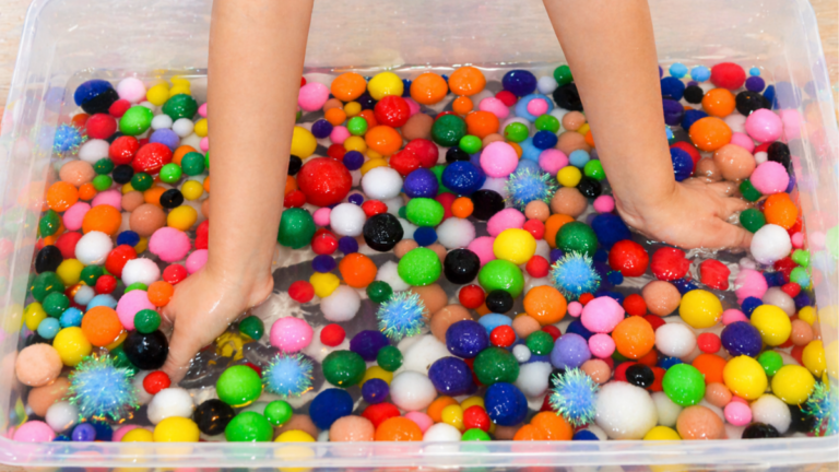 Pom Pom Water Sensory Bin - Happy Toddler Playtime